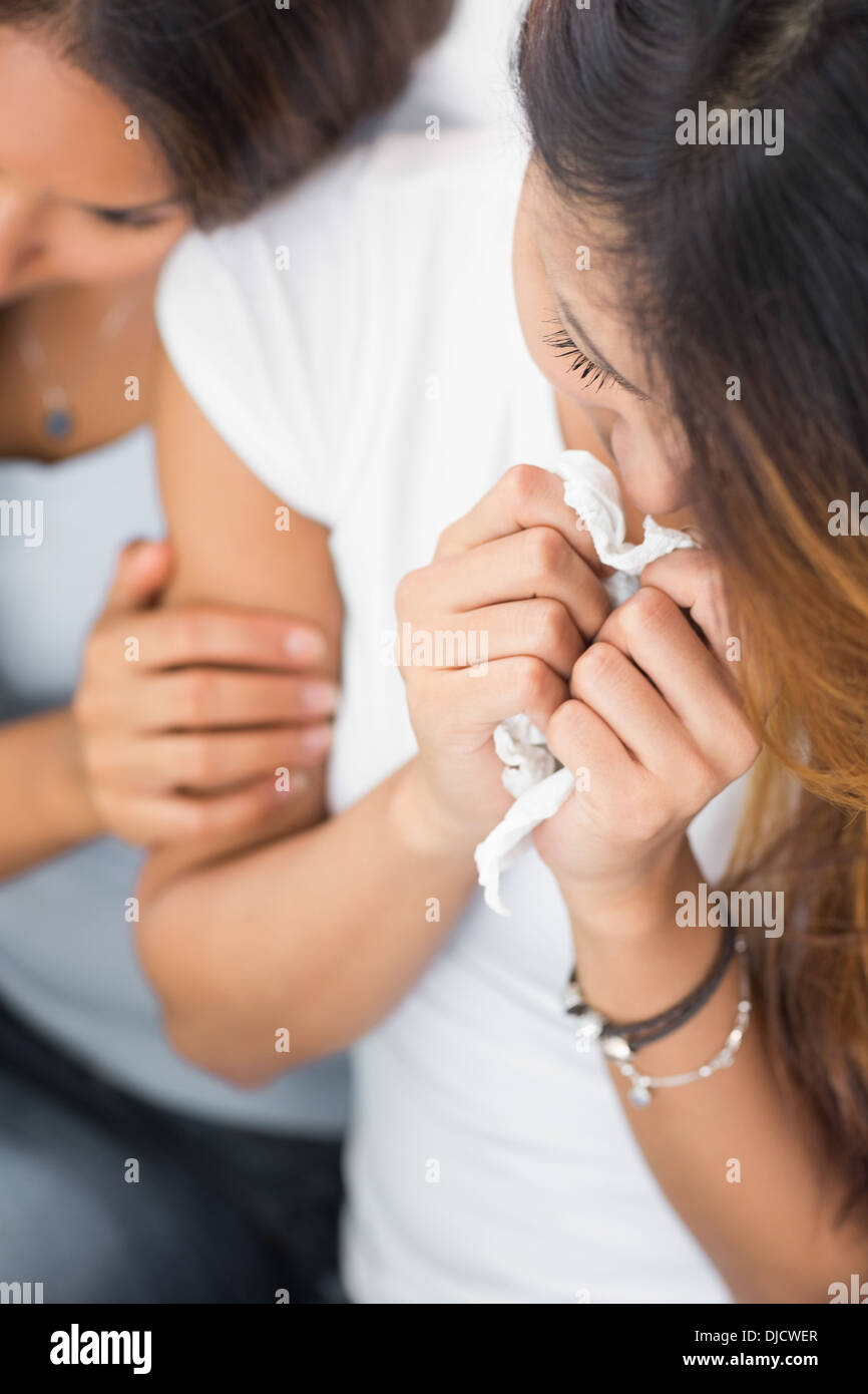 Woman crying being comforted by woman hi-res stock photography and ...