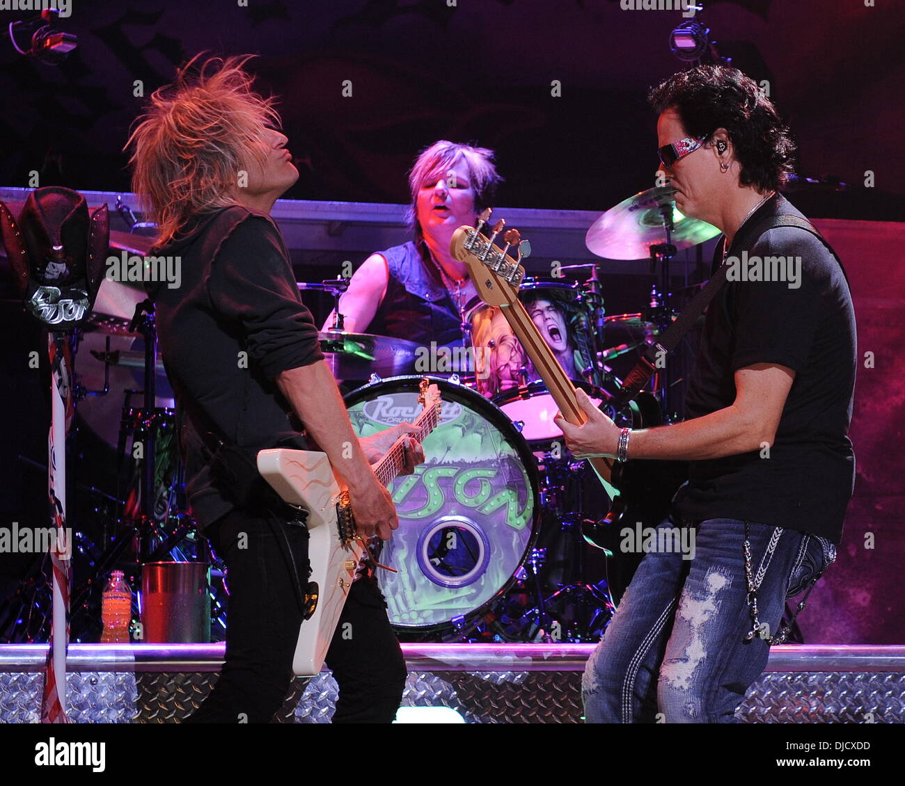 C.C. DeVille, Rikki Rockett and Bobby Dall Poison performs during the Rock of Ages Tour 2012 at ...