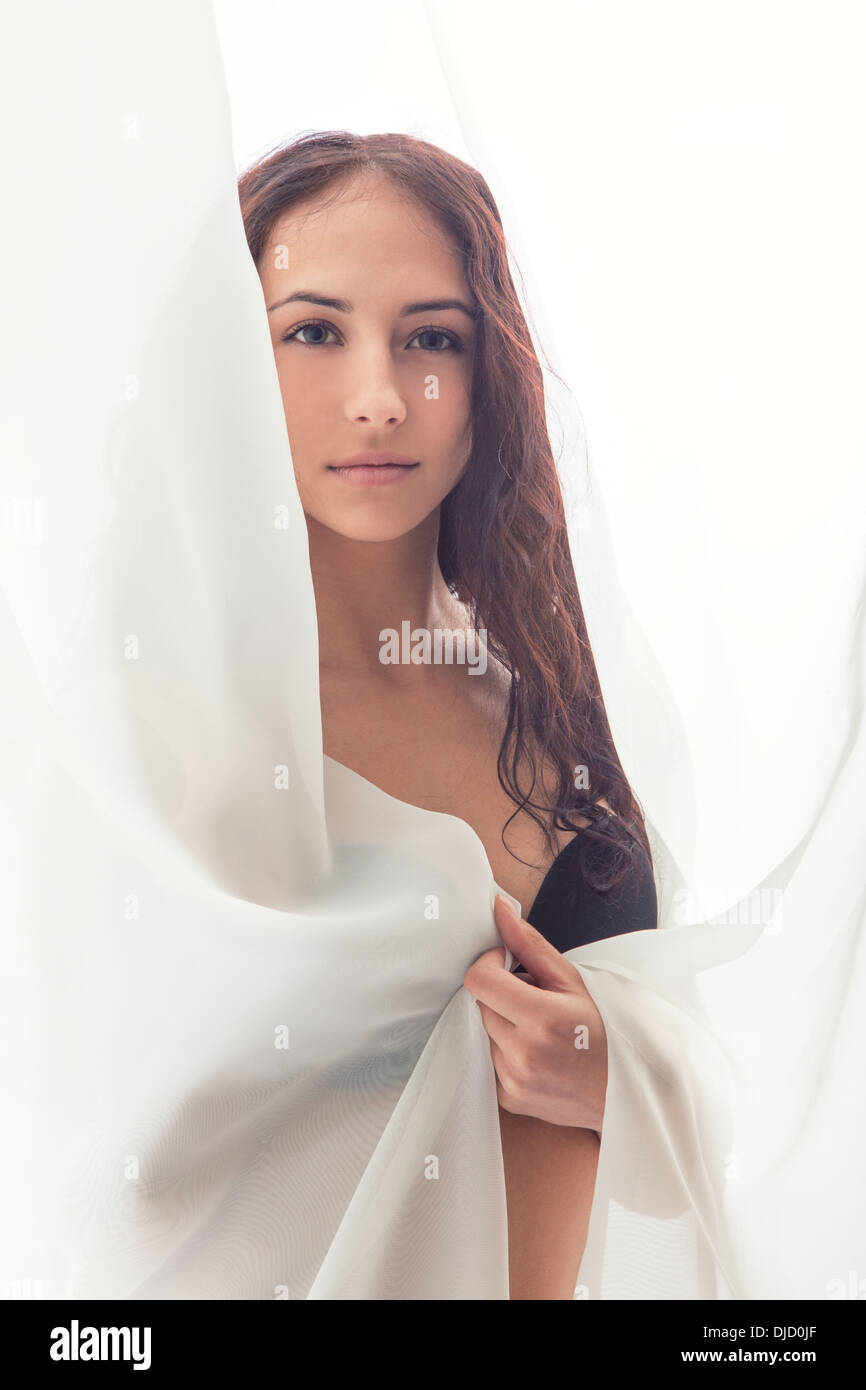 beautiful young woman in black bra and white veil Stock Photo - Alamy
