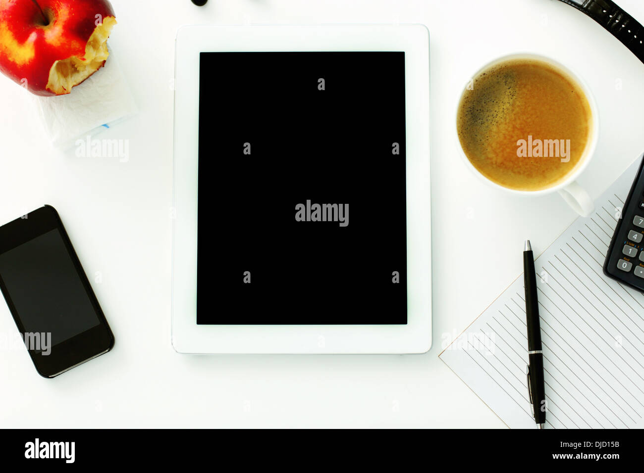 Tablet computer lying on the table at workplace Stock Photo - Alamy