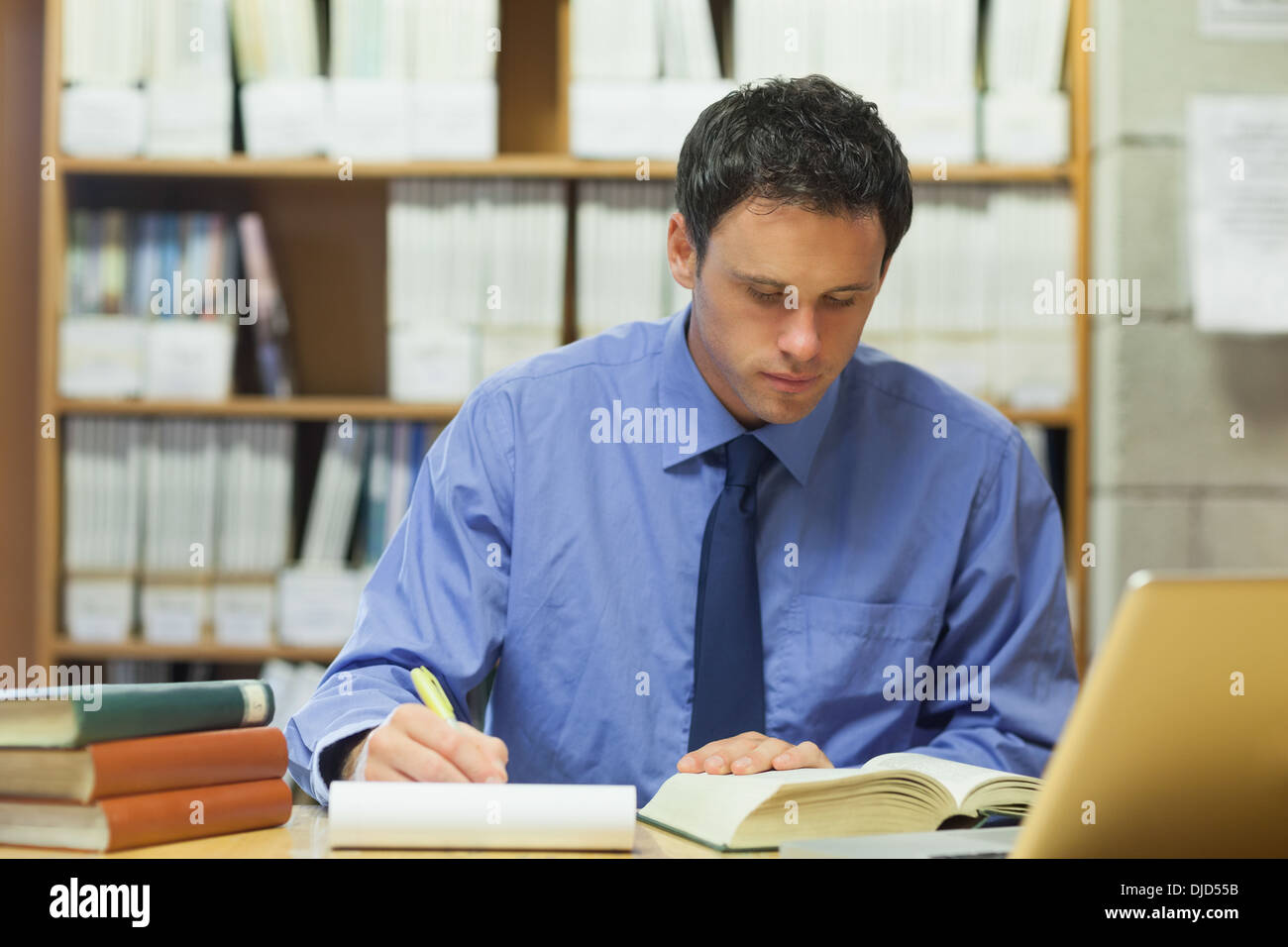 Reading book laptop librarian hi-res stock photography and images - Alamy