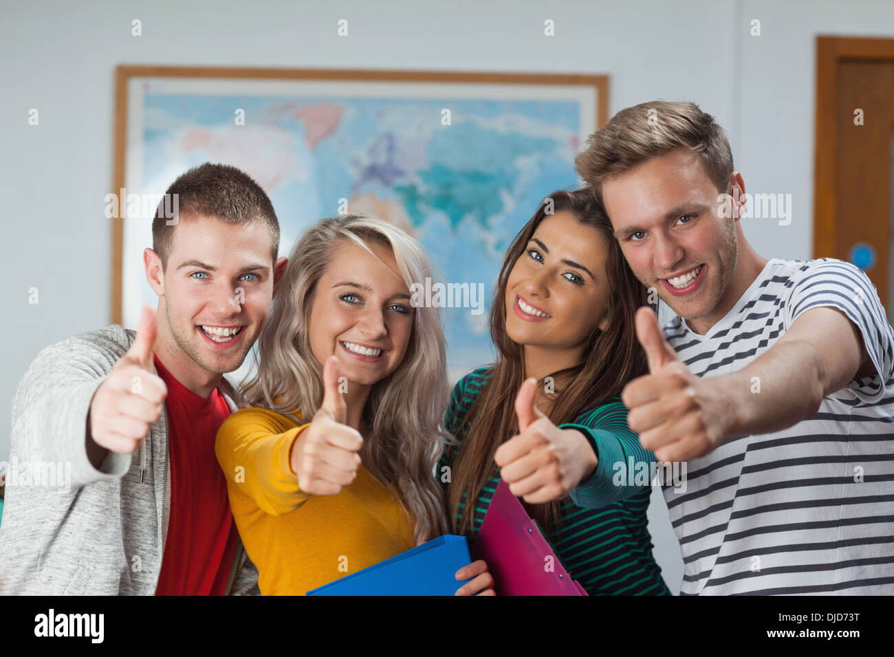Students showing thumbs up school hi-res stock photography and images ...