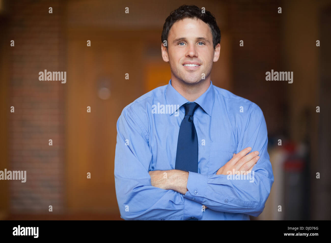 Lucky handsome lecturer looking at camera Stock Photo - Alamy
