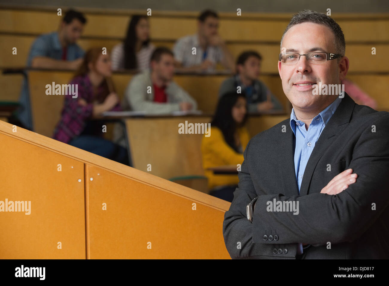 Lecturer standing in front of his class in lecture hall Stock Photo - Alamy