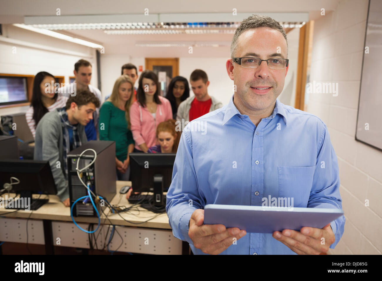 Using a tablet in classroom hi-res stock photography and images - Alamy