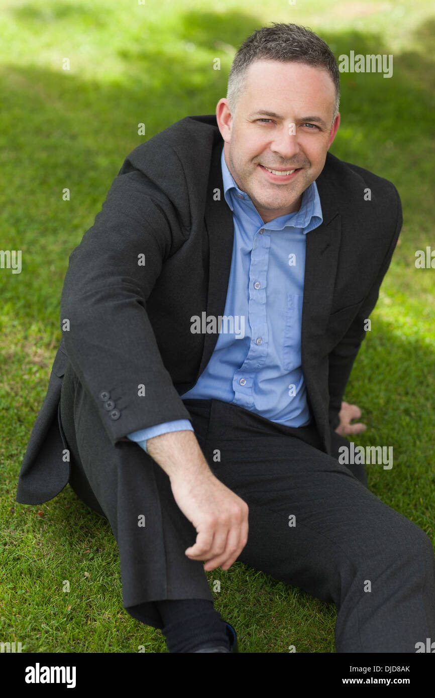 Sitting and smiling at camera hi-res stock photography and images - Alamy