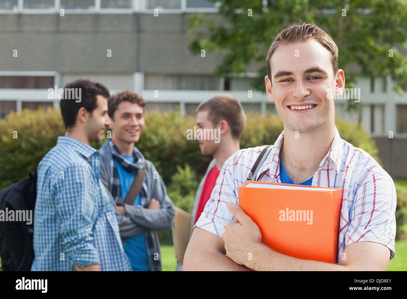 Smiling man looking camera speaking hi-res stock photography and images ...
