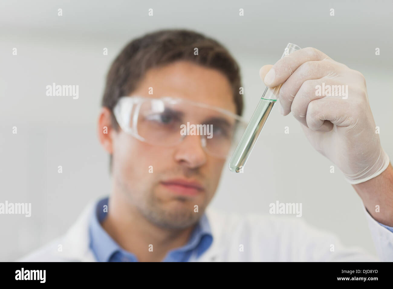 Scientist examining test tube hi-res stock photography and images - Alamy