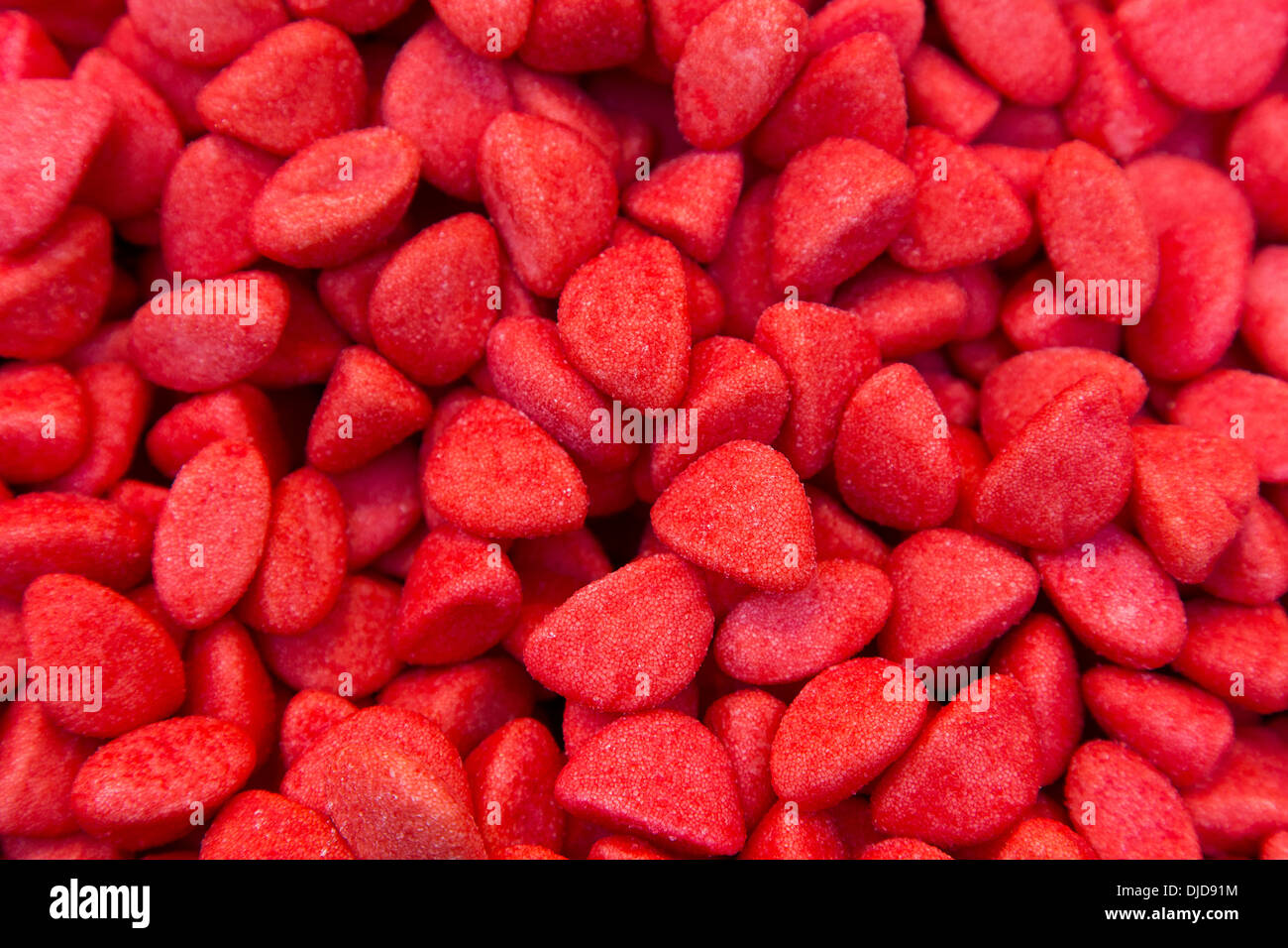 Red colorful strawberry candies Stock Photo - Alamy