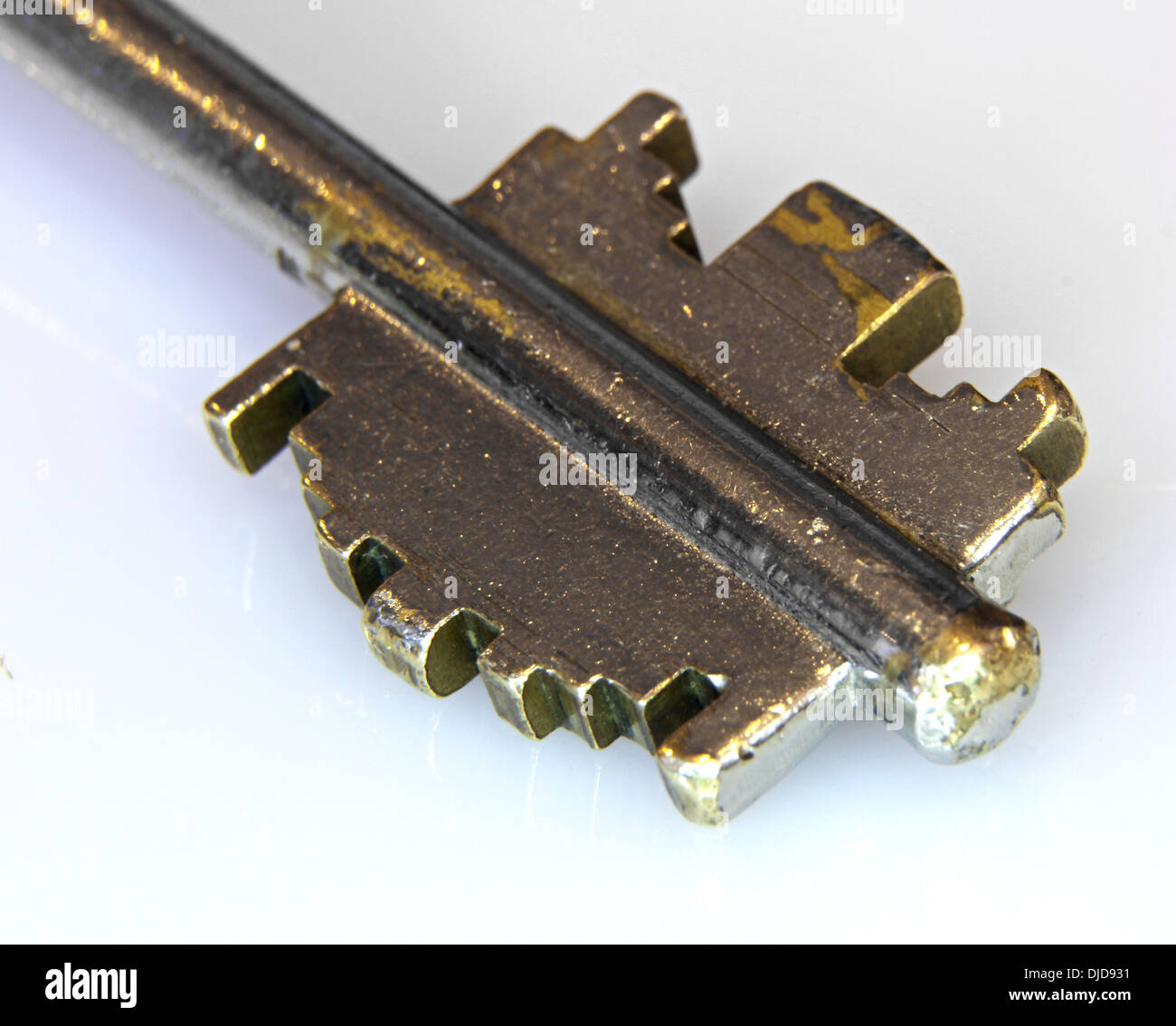 macro of a stainless steel key to open a lock security door Stock Photo ...