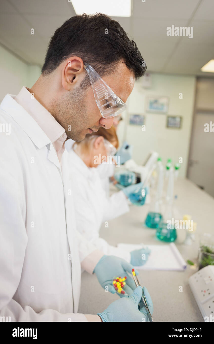 Handsome scientist hi-res stock photography and images - Alamy