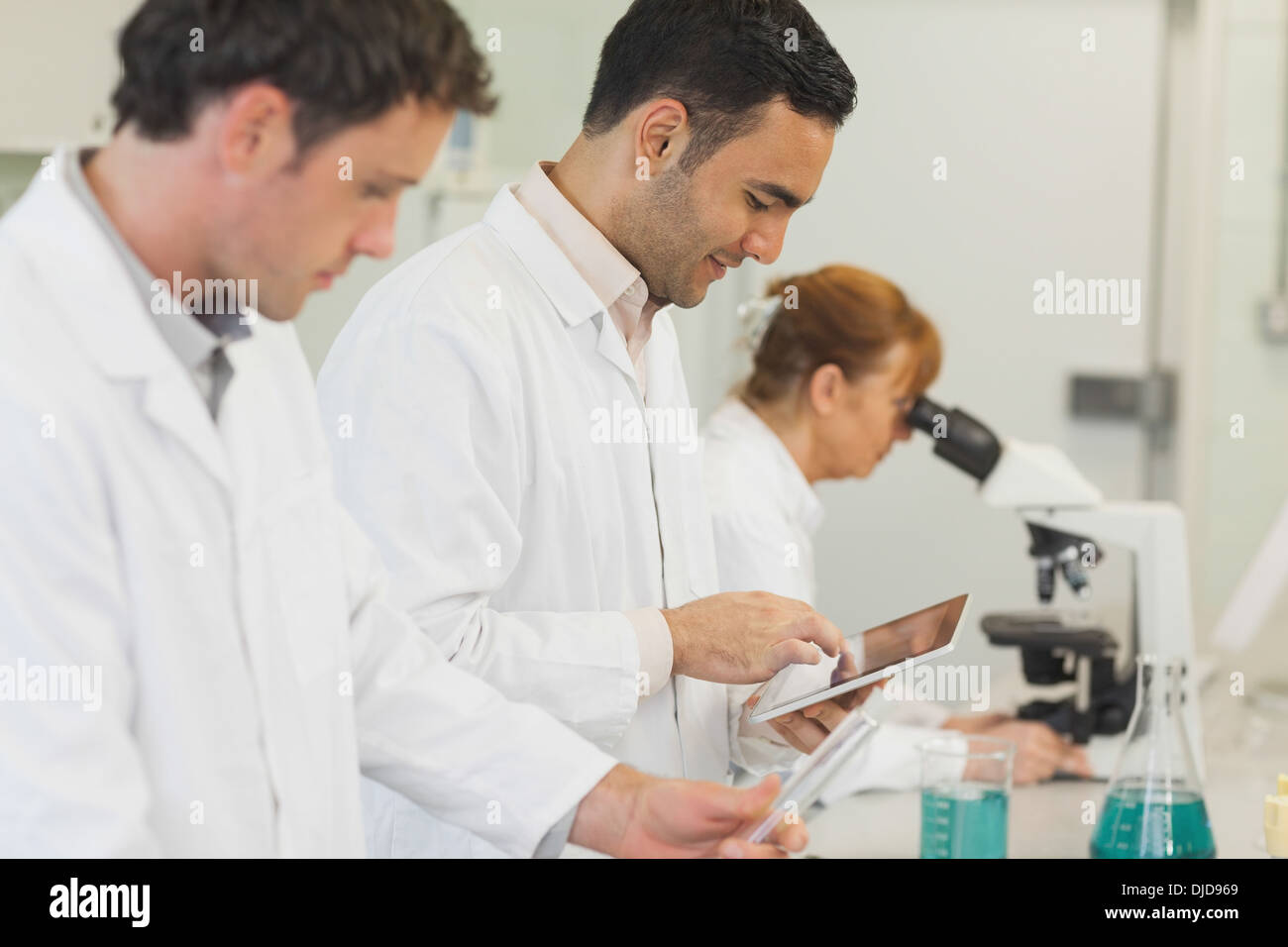 Male scientist using digital hi-res stock photography and images - Alamy
