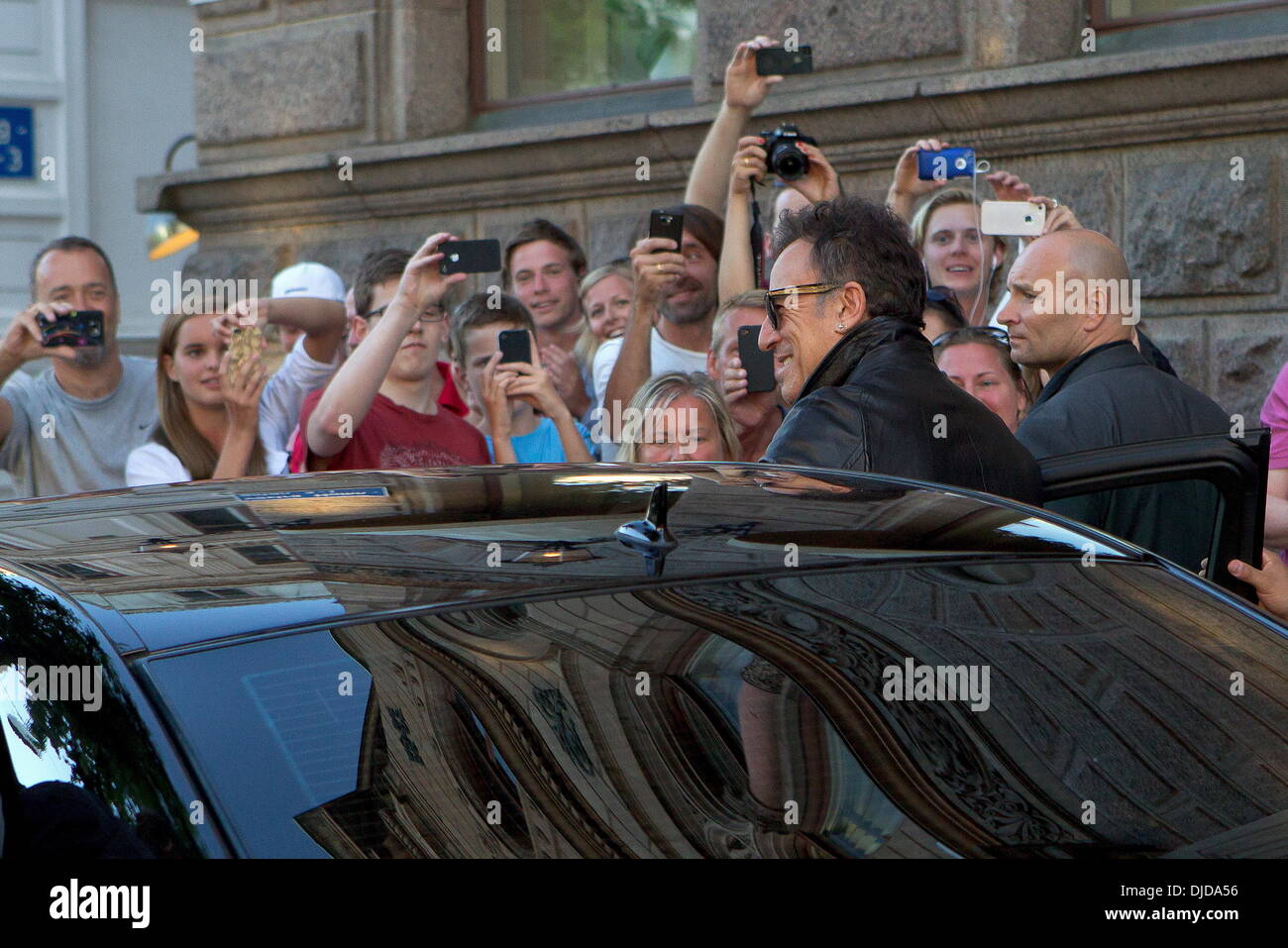 Bruce Springsteen exits his hotel for a dinner at Kometen restaurant ...