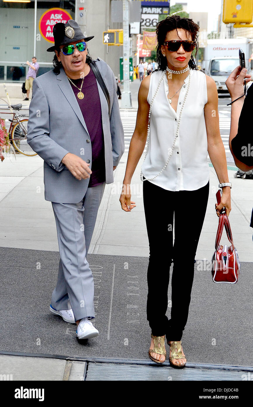 Carlos Santana and Cindy Blackman leaving their hotel in Soho New York ...