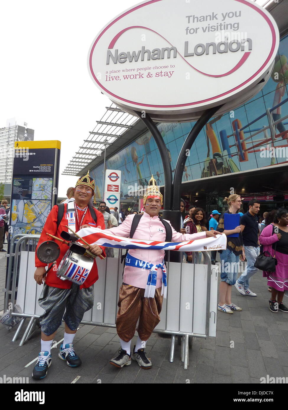 Thailand fans gather outside Stratford train station beside the Olympic ...