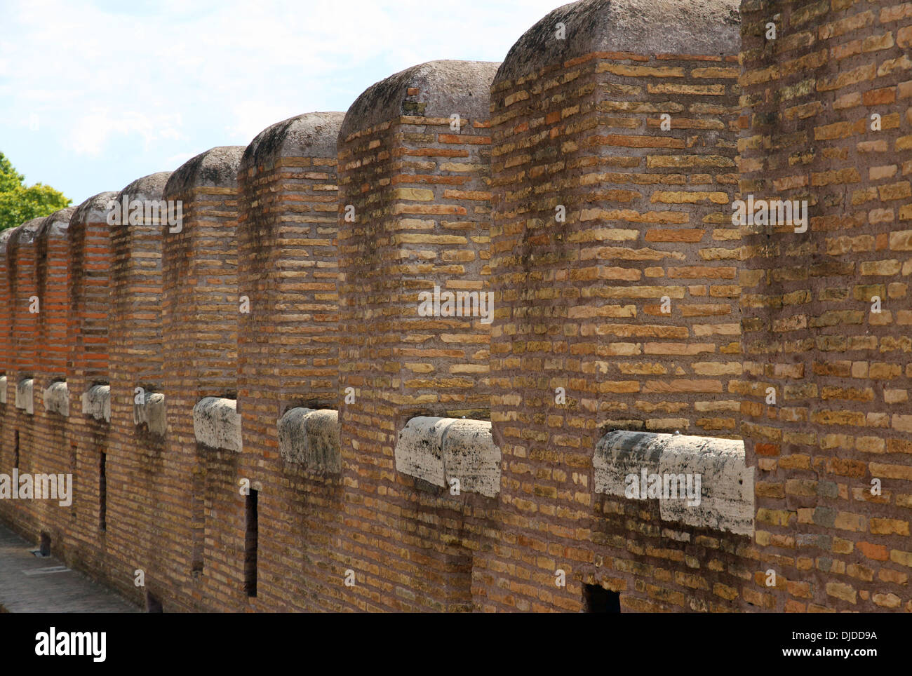 crenellations of the walls of the medieval castle in a big European ...