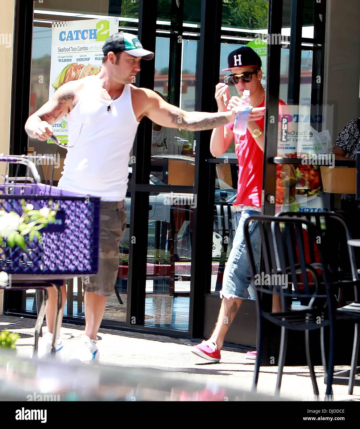Justin Bieber and his dad Jeremy Bieber are seen leaving a fast food ...