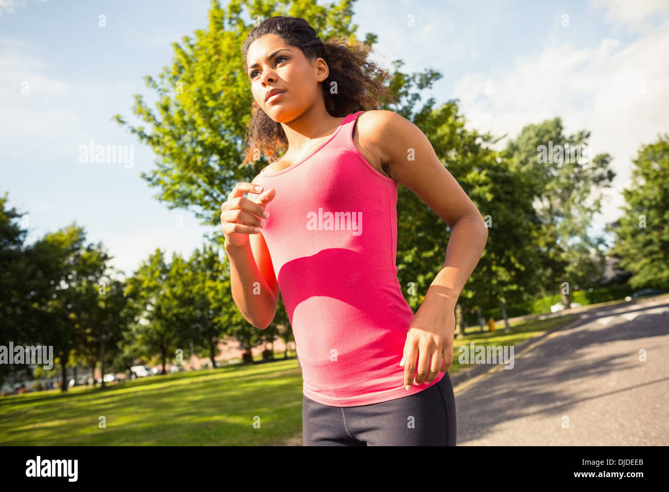 Beautiful healthy woman jogging in hi-res stock photography and images ...