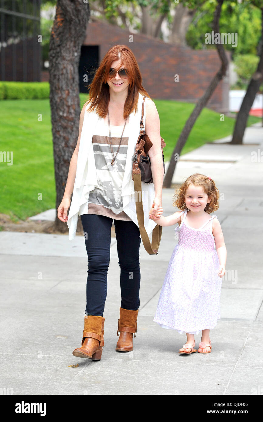 Alyson Hanigan and daughter Satyana Marie Denisof are seen getting ice ...