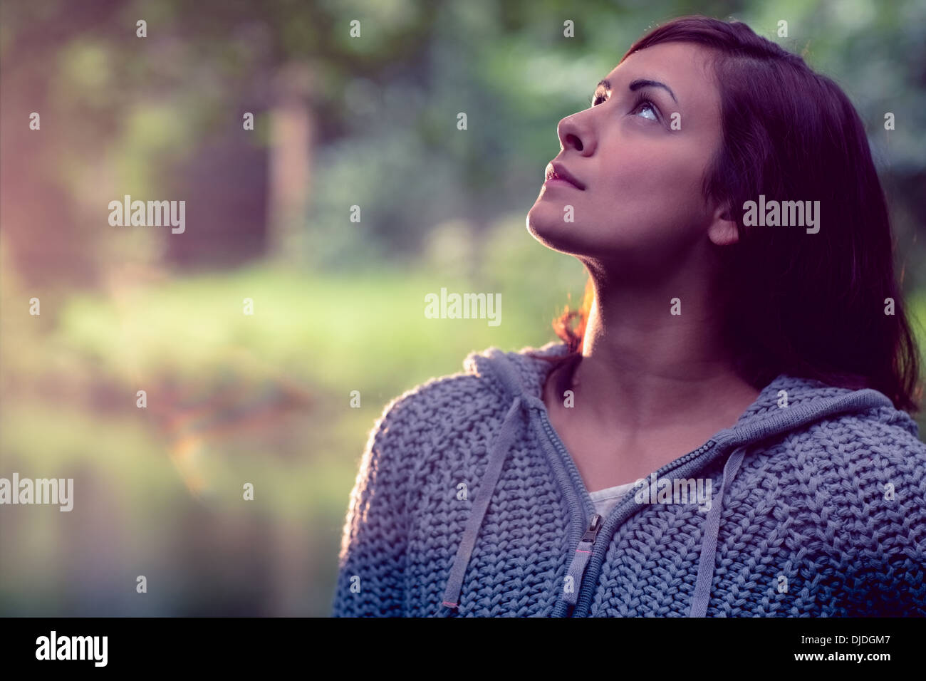 Attractive woman looking up close up hi-res stock photography and ...