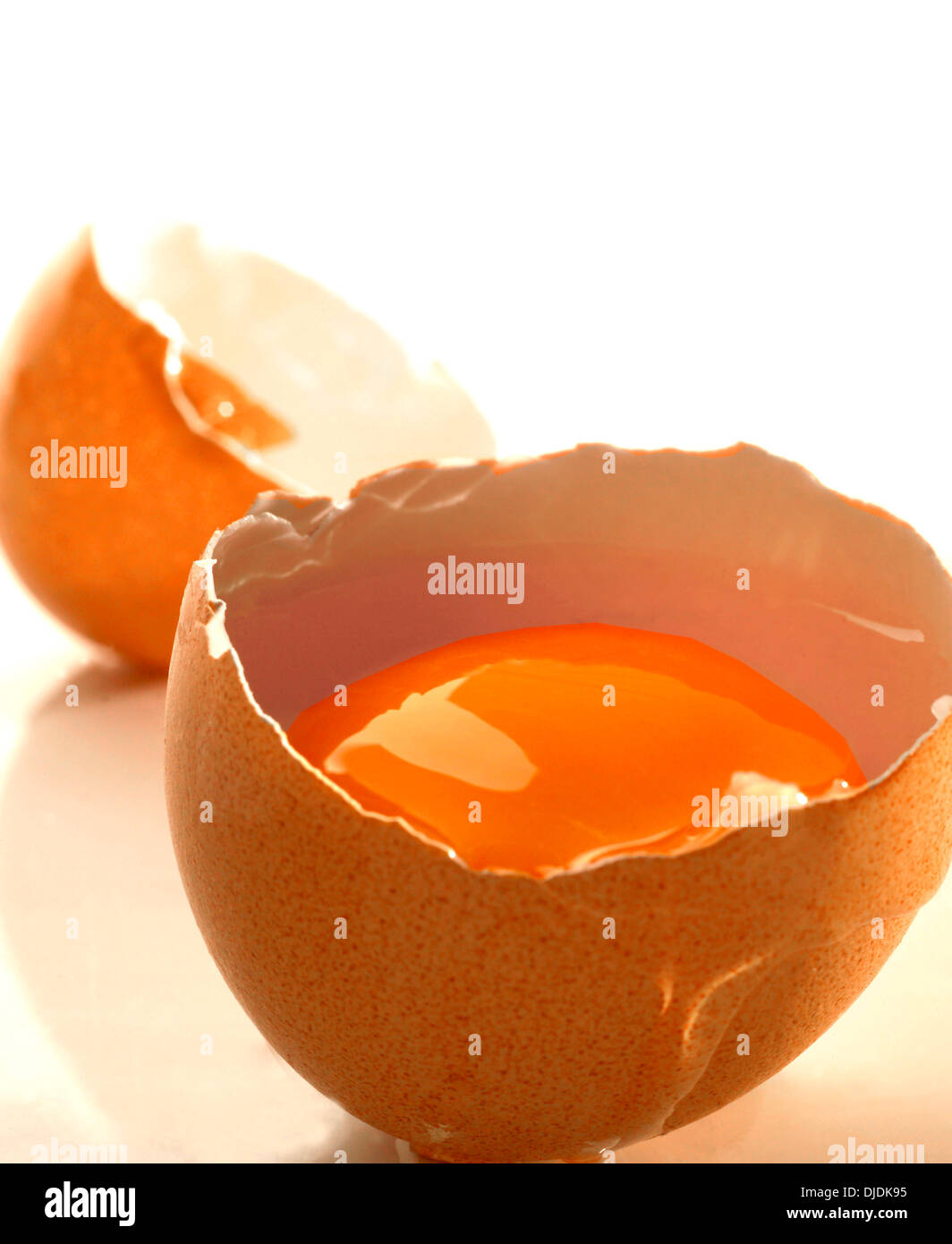 Raw egg, broken open, shell Stock Photo - Alamy