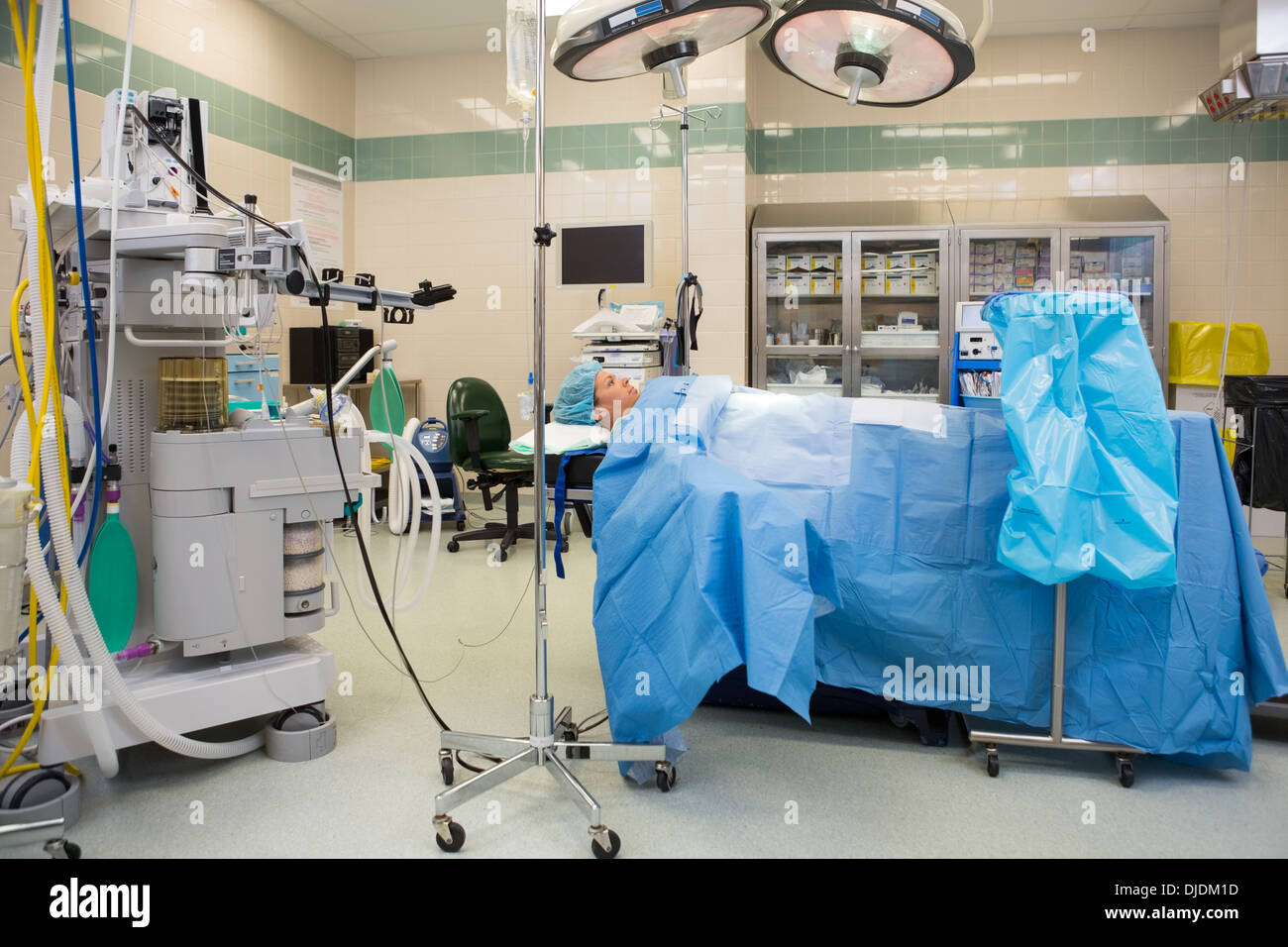 Patient Lying On Bed In Operation Room Stock Photo - Alamy