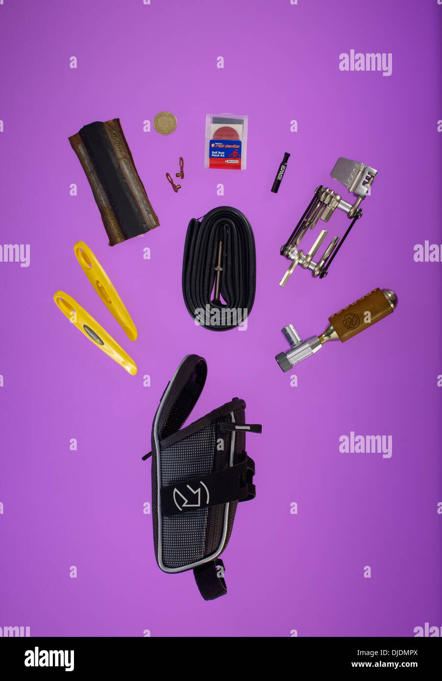 Exploded view of the contents of a small saddle bag for a road cyclist ...