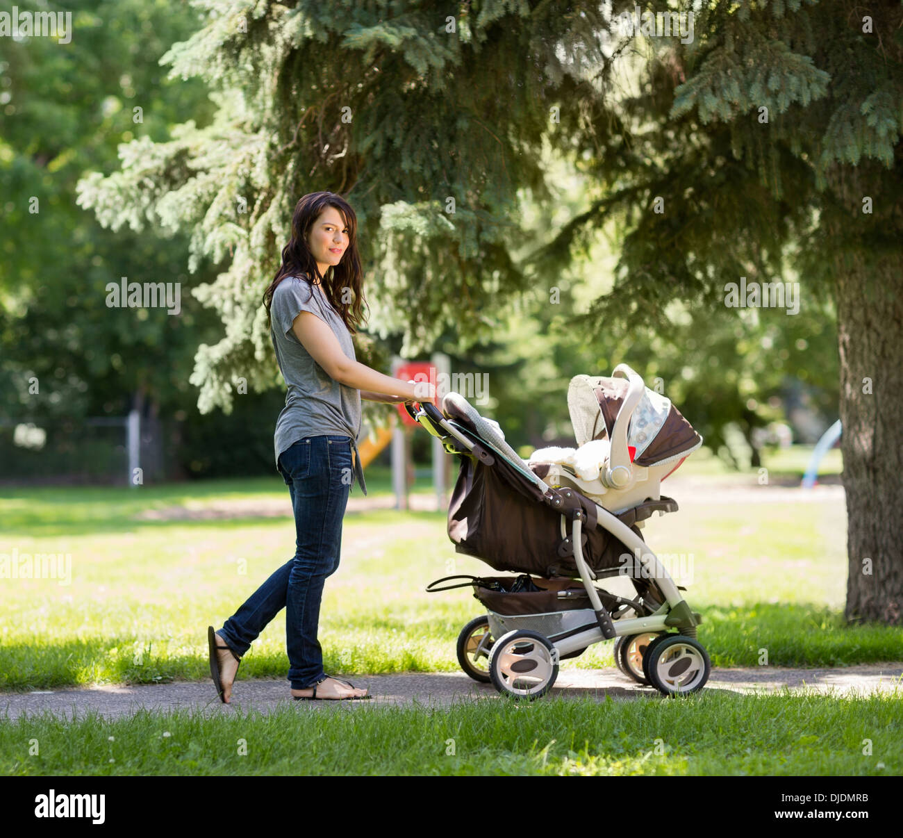 Mom pushing pram hi-res stock photography and images - Alamy