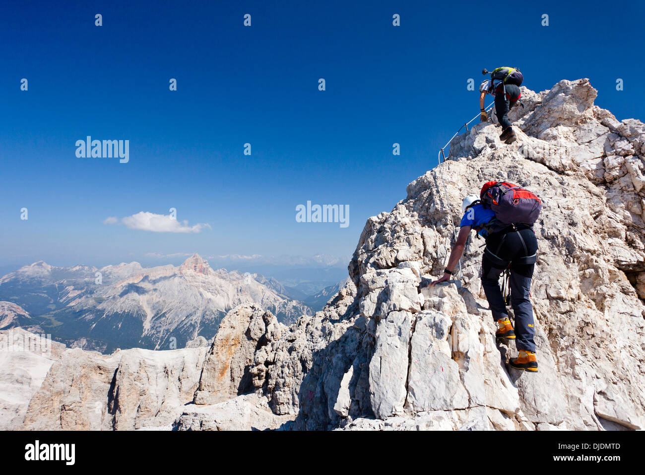 Mountain climbers climbing on the Via Ferrata Marino Bianchi climbing ...