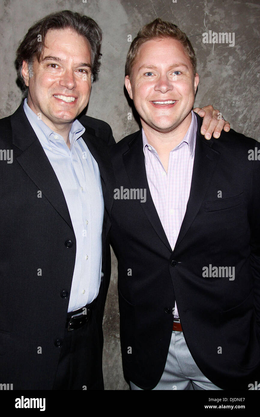 Larry Adams and George Andrew Wolff attending a celebration for the Off ...