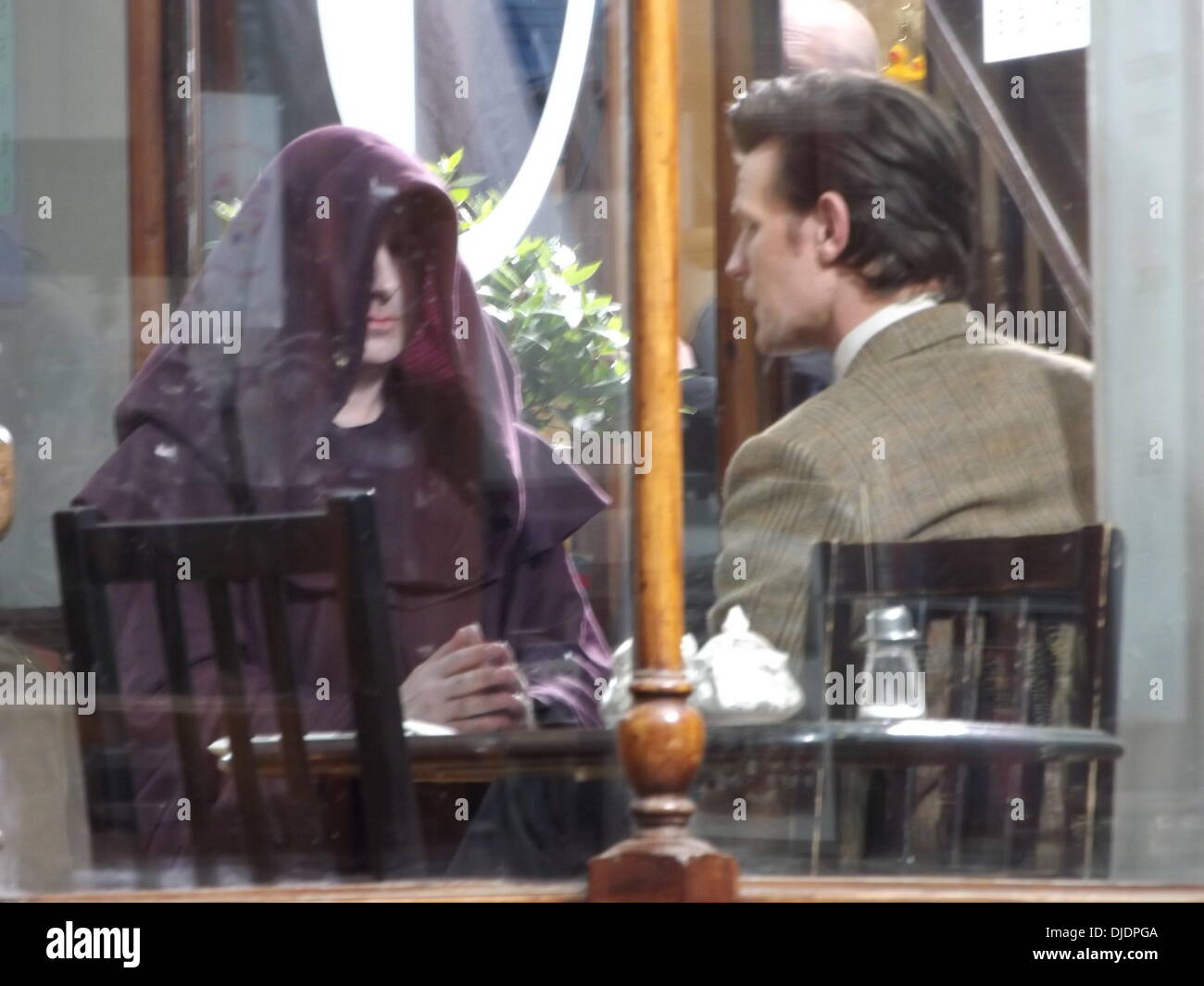 Matt Smith and Barnaby Edwards Matt Smith filming a scene in a cafe with a hooded Barnaby ...