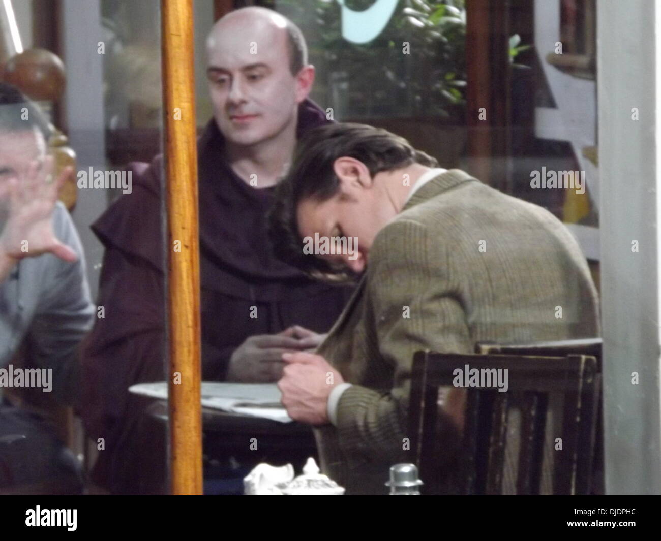 Matt Smith and Barnaby Edwards Matt Smith filming a scene in a cafe with a hooded Barnaby ...