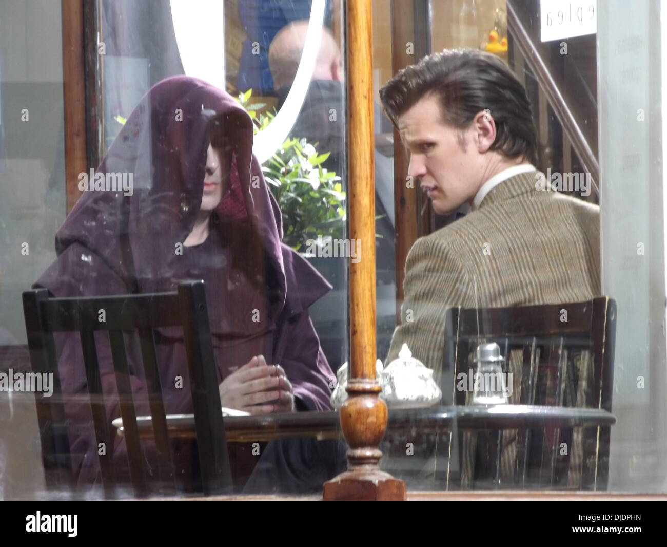 Matt Smith and Barnaby Edwards Matt Smith filming a scene in a cafe with a hooded Barnaby ...