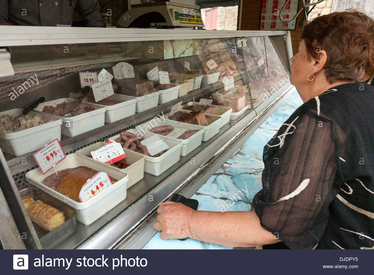 Buying Meat Shop High Resolution Stock Photography and Images - Alamy