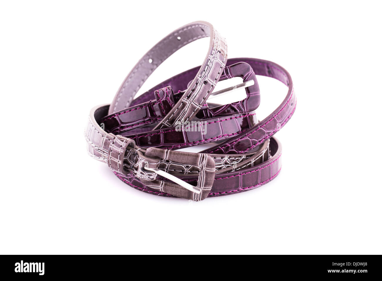 Stylish belts isolated on white background Stock Photo - Alamy