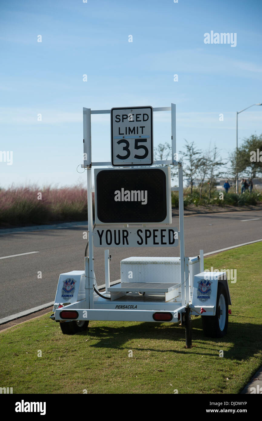Mobile speed machine on roadside advising motorists of their driving ...