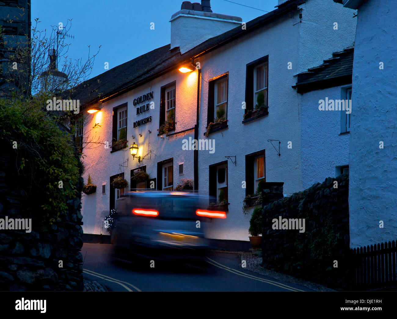 The Golden Rule pub, at dusk, Ambleside, Lake District National Park ...