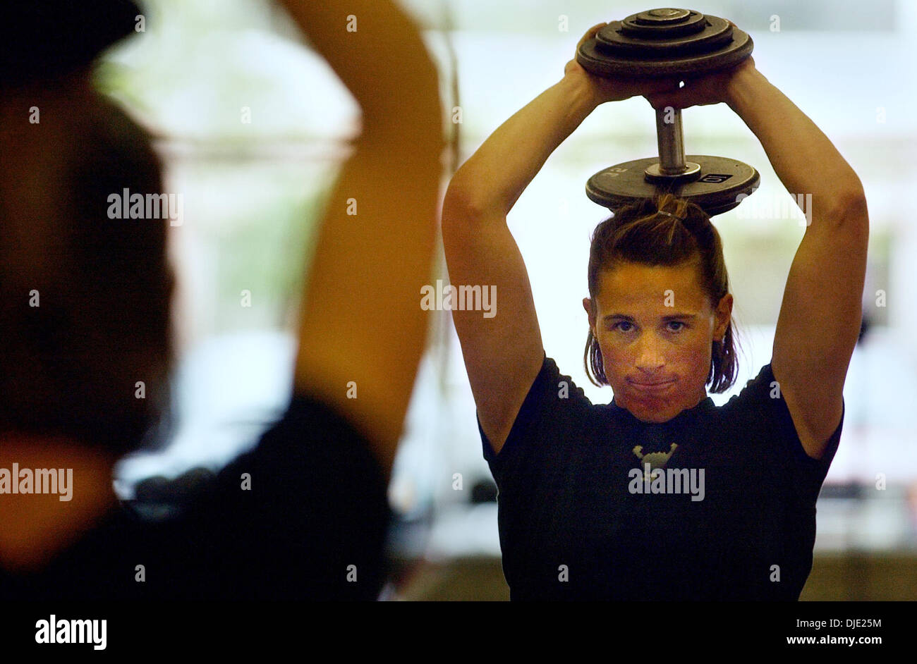 Jan 14, 2004; Phoenix, AZ, USA; STACY DRAGILA lifts a dumbell in a gym ...