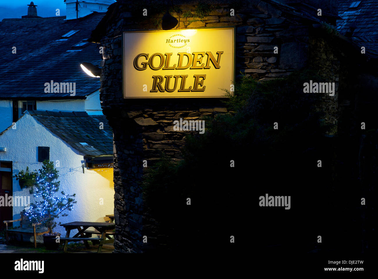 Illuminated sign for pub, the Golden Rule, in Ambleside, Lake District ...