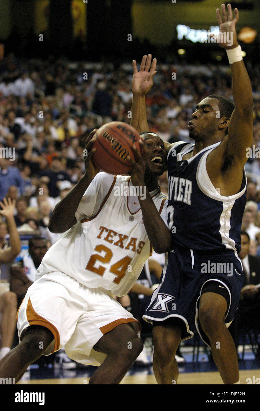 Mar 25, 2004; Atlanta, GA, USA; Texas guard ROYAL IVEY (24) drives into ...