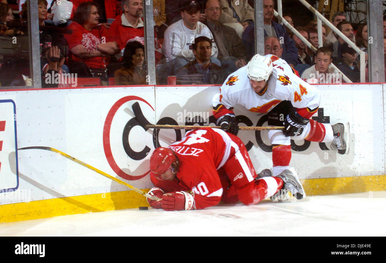 Apr 22, 2004; Detroit, MI, USA; HENRIK ZETTERBERG and Calgary's RHETT ...