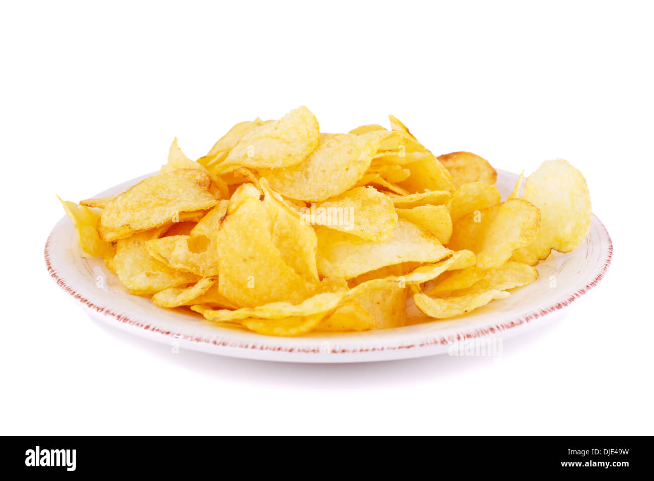 Potato chips on plate isolated on white background Stock Photo - Alamy