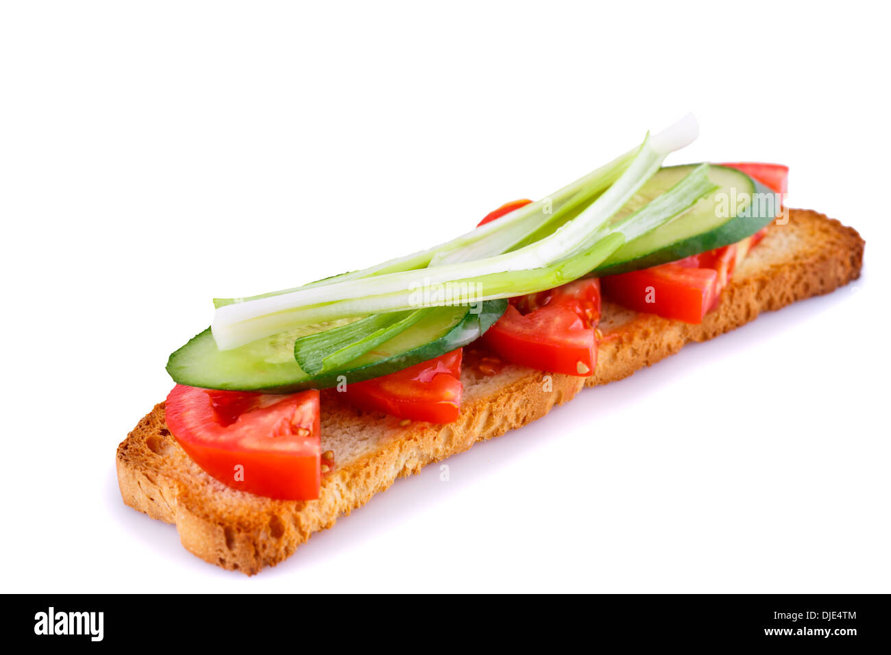 Long rusk sandwich with tomato, cucumber and onion isolated on white ...