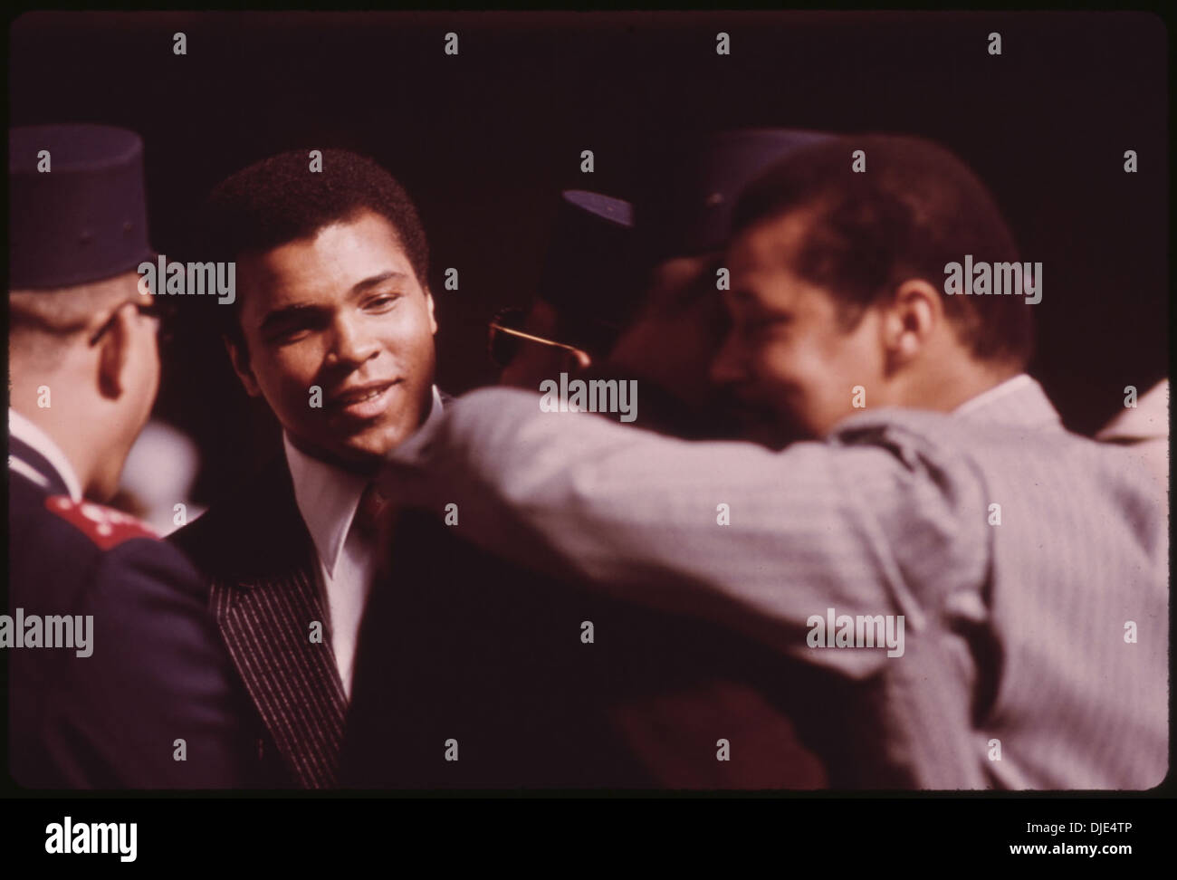 WORLD HEAVYWEIGHT BOXING CHAMPION MUHAMMAD ALI, A BLACK MUSLIM, ATTENDS ...