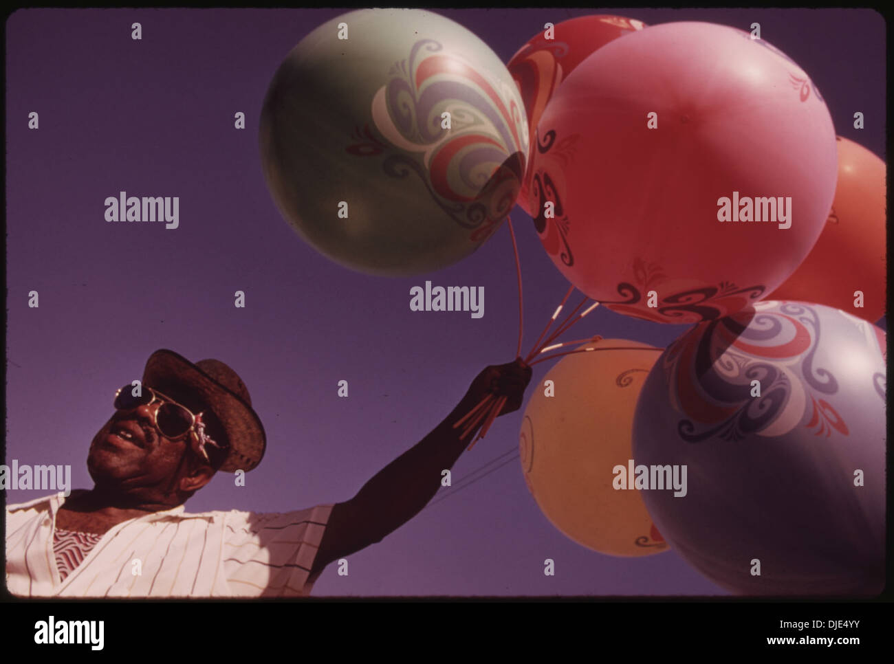 This photograph shows a Black balloon salesman on 47th Street, South ...