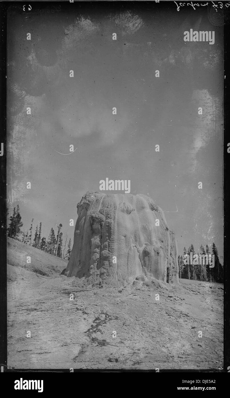 This photograph captures Lone Star Geyser, located in Yellowstone ...