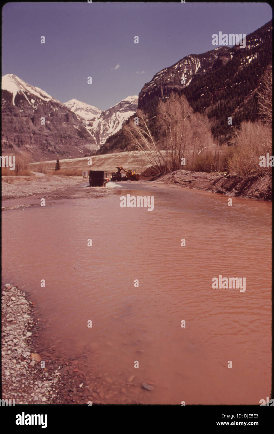 A polluted stream, marked by contamination, affects water quality and ...