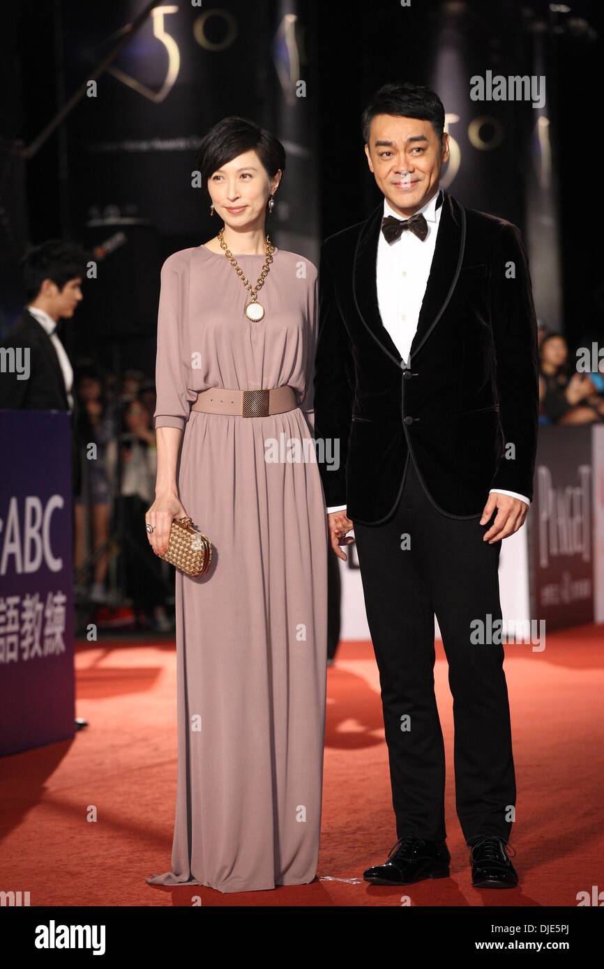 Taipei, China. 23rd Nov, 2013. Sean Andy and wife Amy Kwok arrive at ...