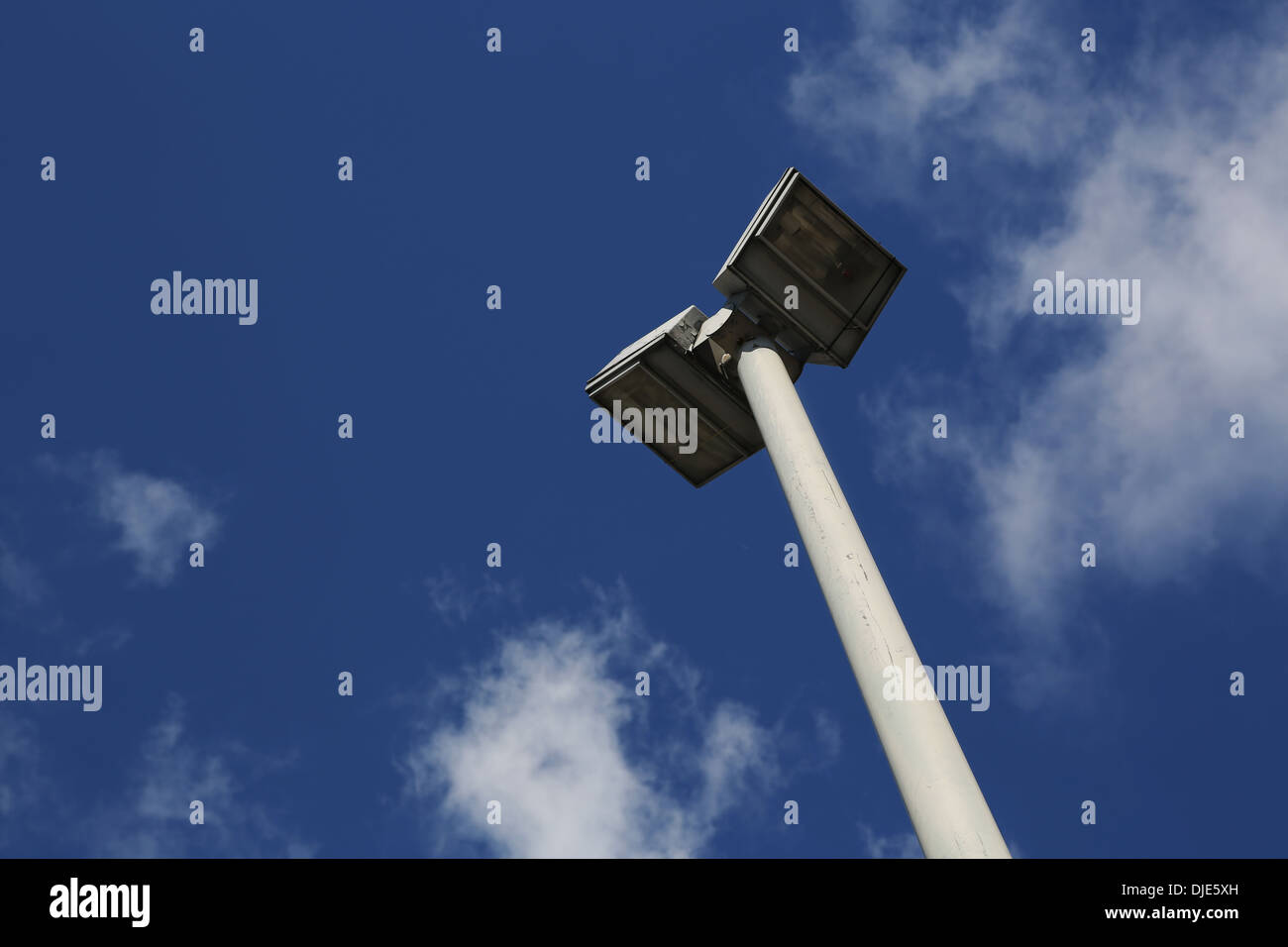 white halogen metal lamp post Stock Photo - Alamy