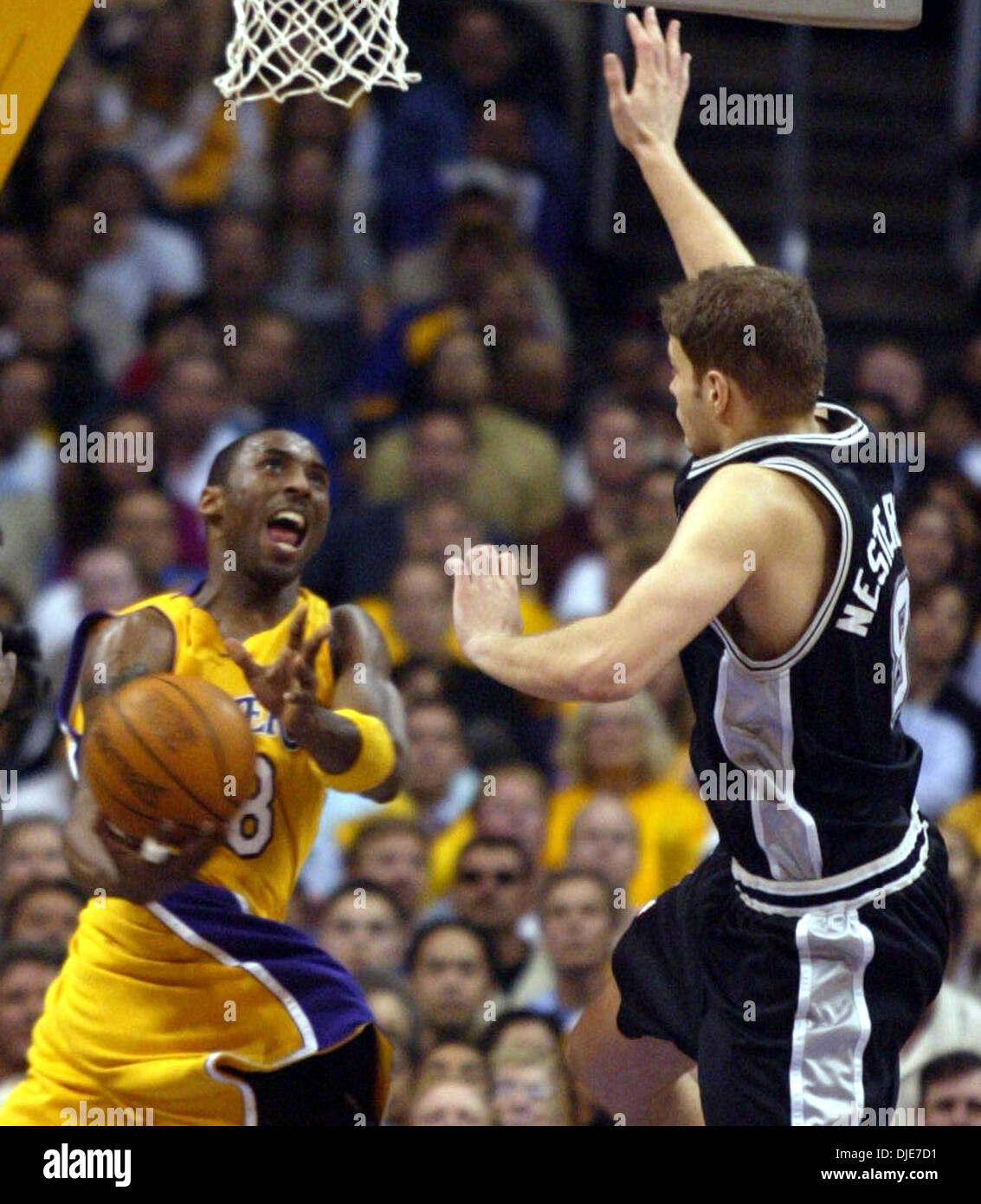 May 11, 2004; Los Angeles, CA, USA; Lakers' KOBE BRYANT driving to the ...